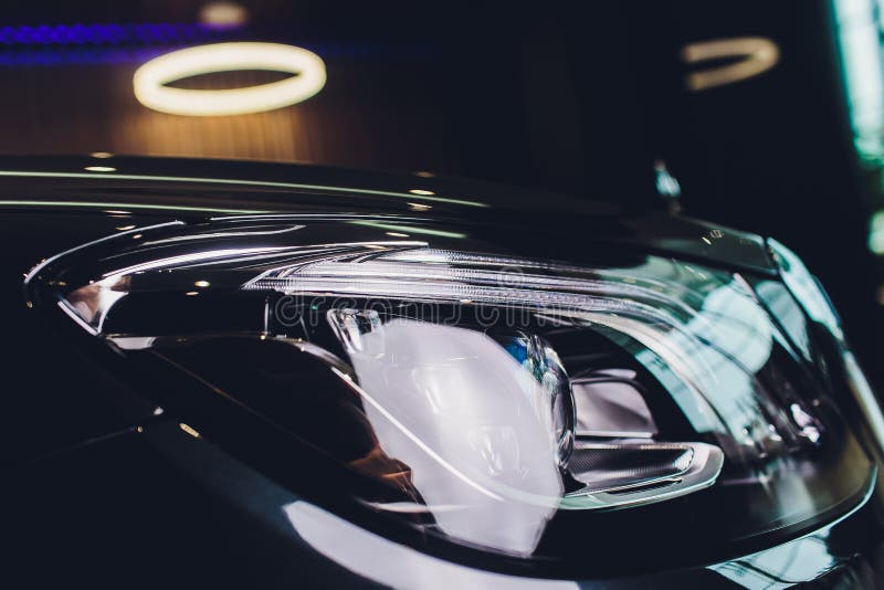 Close Up Headlights Front Side View , Black Color Car in Room. Stock ...