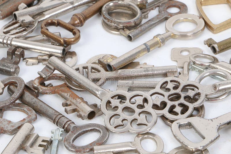 A Close Up of a Heap of Different Old Keys on a White Ground Stock ...