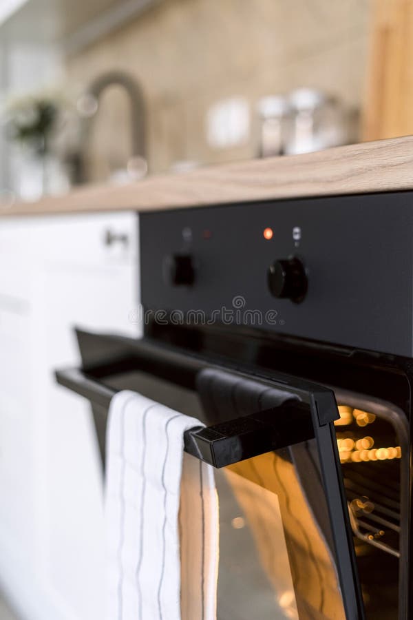 Closeup on Heating Up Electric Oven with Ajar Door at Kitchen Stock ...