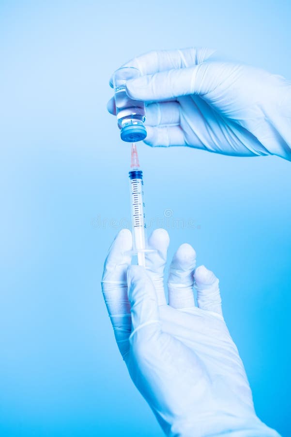 Close-up Held a Syringe and Potion Stock Photo - Image of career ...