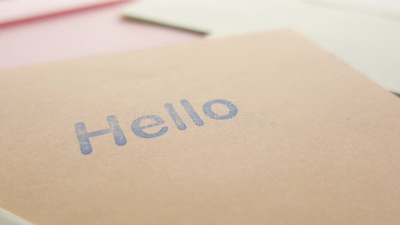 Close Up of Hello Text in Blue Color on a Envelope Stock Video - Video ...