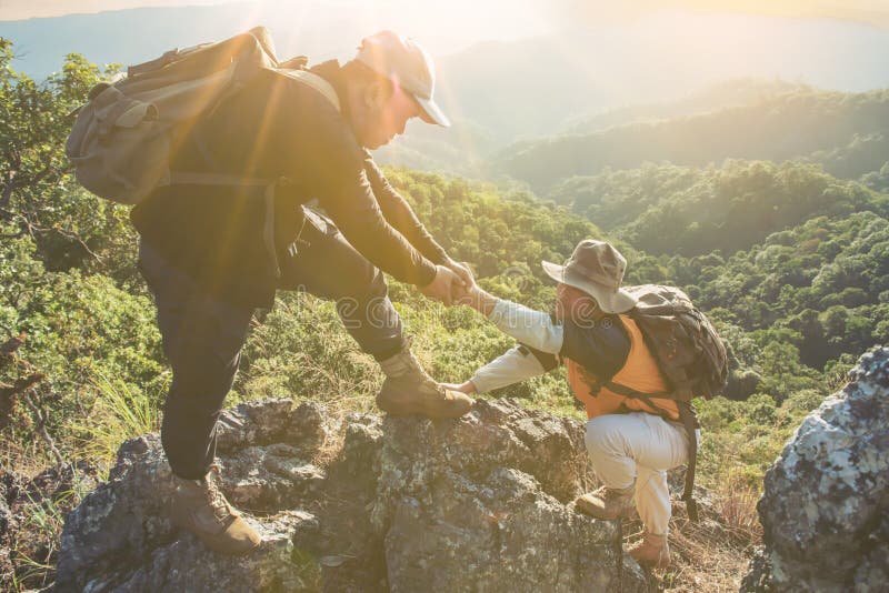 Close-up of Helping Hand, Hiking Help Each Other. Focus on Hands Stock ...
