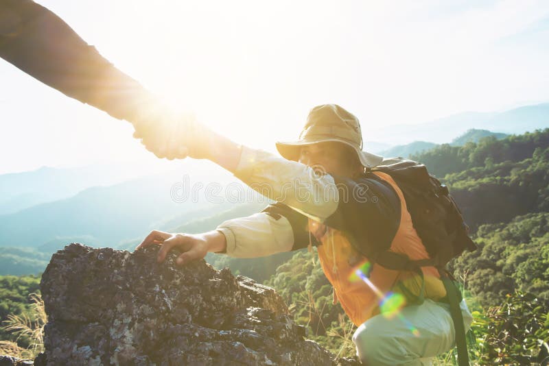 Close-up of Helping Hand, Hiking Help Each Other. Focus on Hands Stock ...