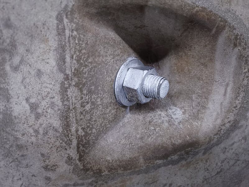 Hexagonal Nut with Washer Fastened with Threaded Stud on Concrete Wall ...