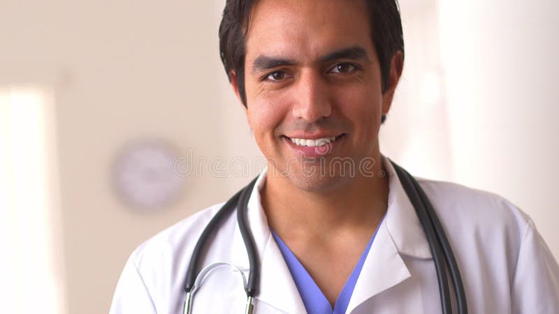 Close Up of Smiling Hispanic Business Woman in Office Looking at Camera ... Close Up of Smiling Hispanic Business Woman in Office Looking at Camera ...