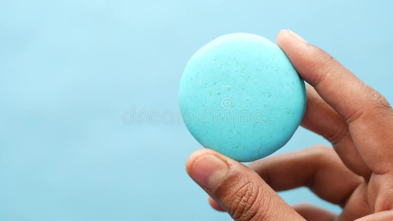 Close Up of Holding Blue Color Macaroon Stock Footage - Video of ...