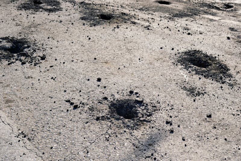 Close-up of a Hole in the Asphalt after Being Hit by a Hydraulic Hammer ...