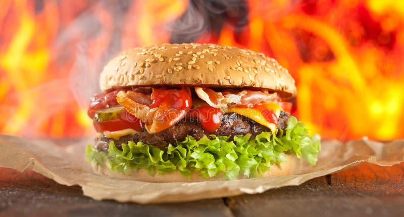 Close-up of Home Made Burgers with Fire Flames Stock Image - Image of ...