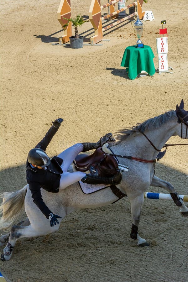 Close Up of Horse Rider Falling from the Horse during an Equestrian ...