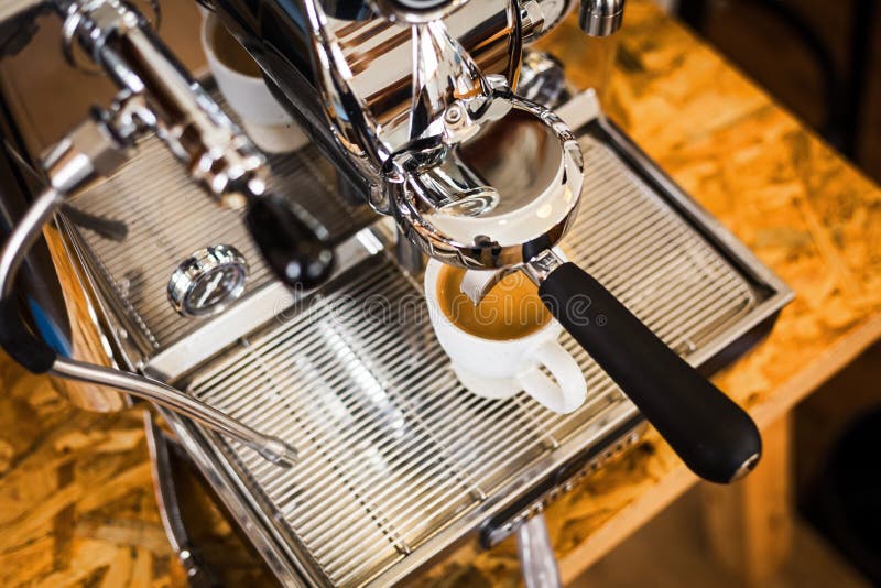 Close-up of Hot Coffee from Coffee Machine. Professional Coffee Brewing ...