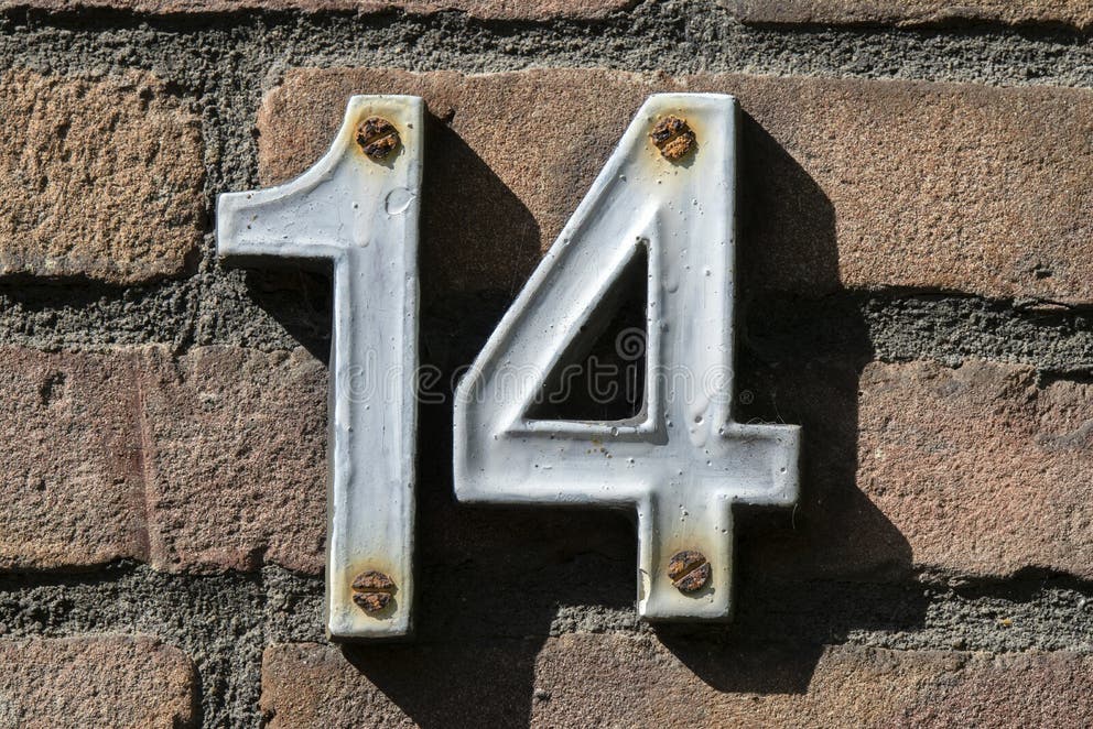 Close Up House Number 14 stock image. Image of concept - 188153939