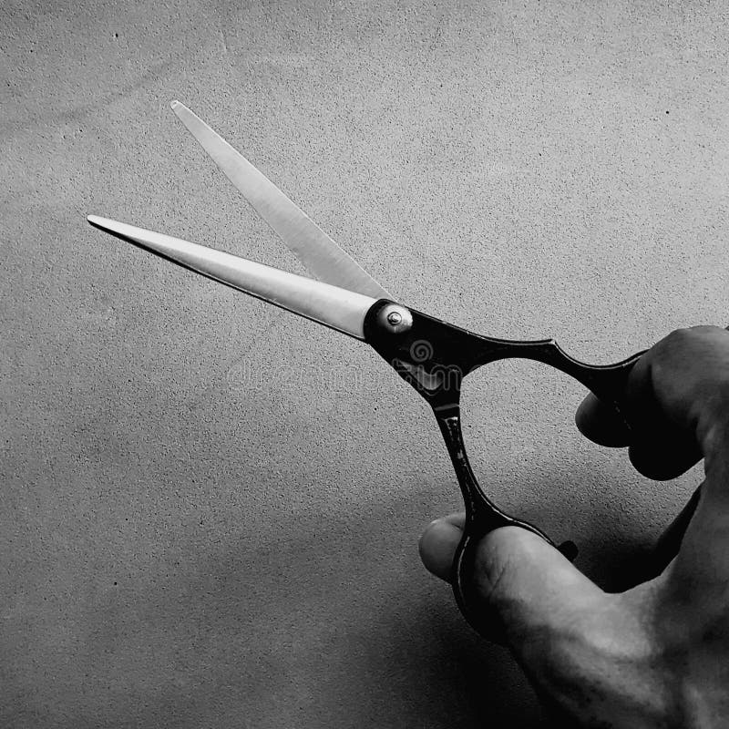 Close Up of Human Hand Holding Scissors Stock Photo - Image of iron ...