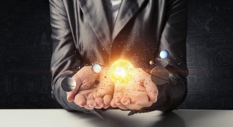 Solar system in hands stock photo. Image of hand, glowing - 112240900