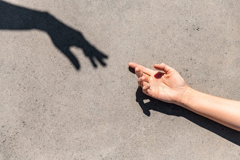 Close Up of Human Hand Reaching To Shadow Stock Image - Image of ...