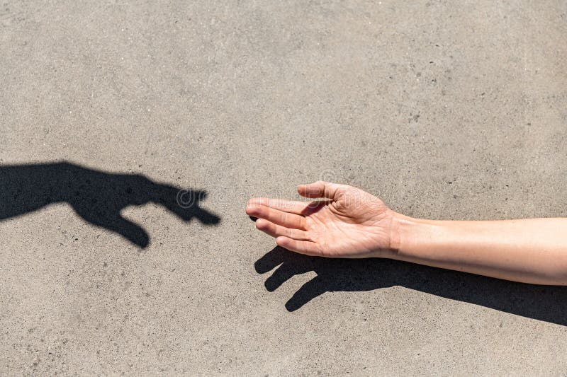Close Up of Human Hand Reaching To Shadow Stock Photo - Image of help ...