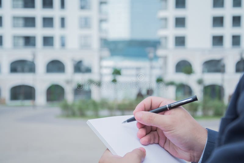 Close Up Human Hand Signing on Formal Paper Stock Image - Image of ...