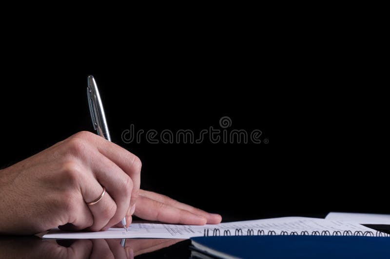 Close Up Human Hand Signing on Formal Paper at the Stock Photo - Image ...