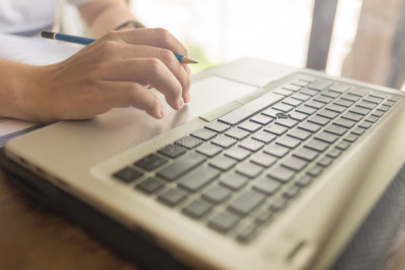 Close Up of Human Hand Tapping on Laptop Touchpad Stock Photo - Image ...