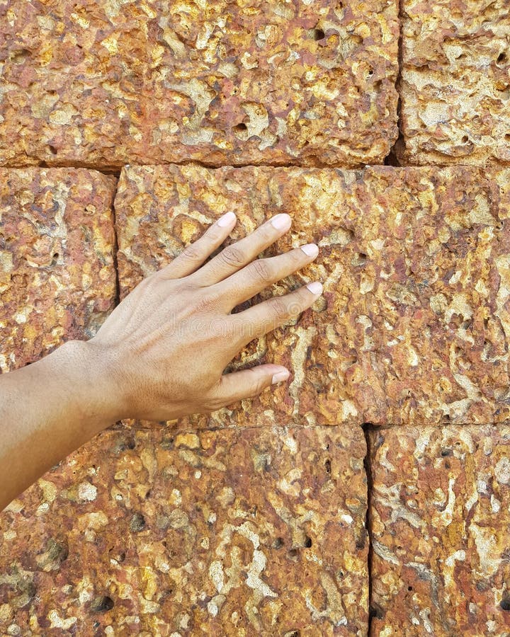 Close Up of Human Hand Touching Brick Wall Stock Image - Image of retro ...