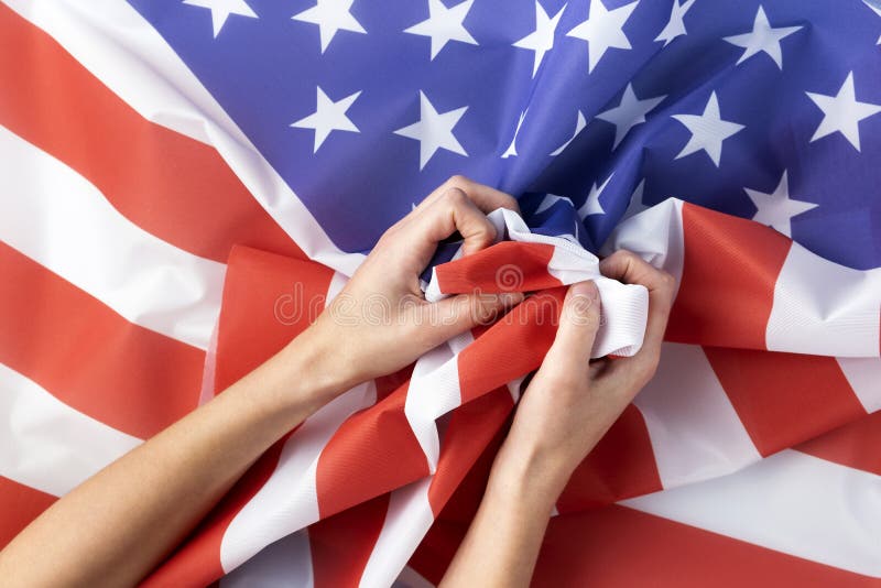 Close Up of Human Hands Holding American Flag Stock Image - Image of ...