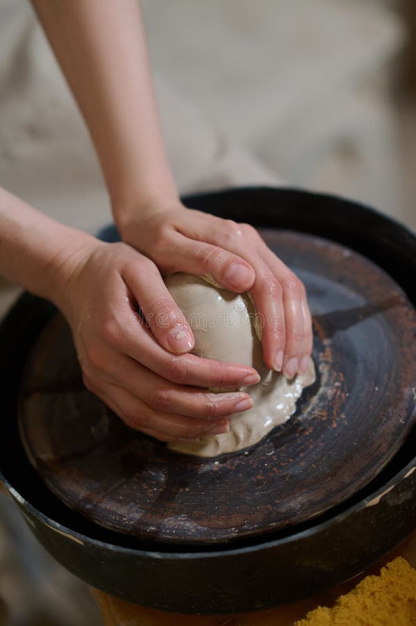 Close Up of Human Hands Molding Clay on a Pottery Wheel Stock Photo ...
