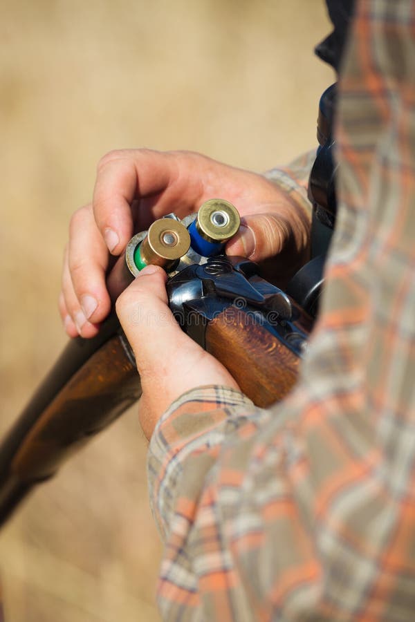 Close-up of a Hunter Loading His Shotgun Stock Image - Image of opening ...