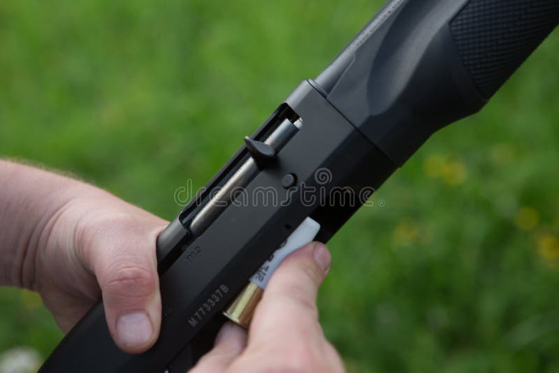 Close Up of a Hunter Loading His Weapon Editorial Photo - Image of ...