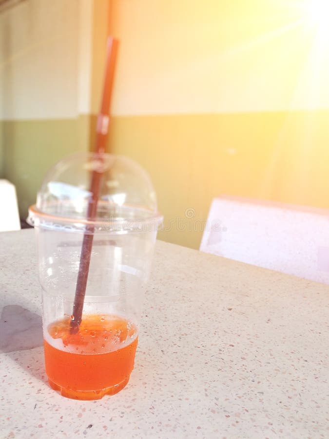 Close Up Iced Lemon Tea in Clear Plastic Cup on Summer Time Stock Photo ...