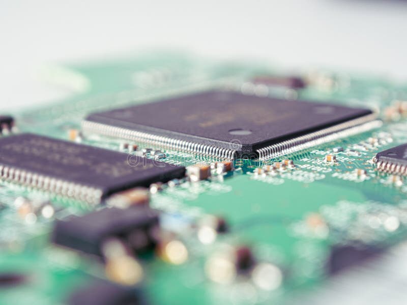 Close-up of ICs, Chips, Diodes and Capacitors on a Printed Circuit ...
