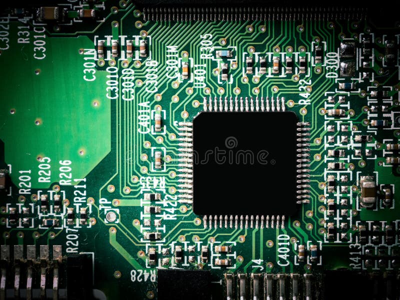 Close-up of ICs, Chips, Diodes and Capacitors on a Printed Circuit ...
