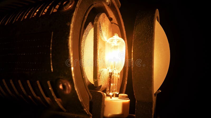 Close Up of Illuminated Halogen Bulb Inside Spotlight Housing Stock ...