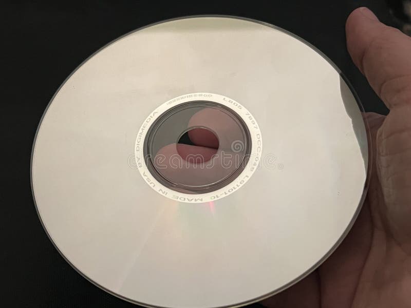 Hand Holding Blank CD stock image. Image of compact - 373039177