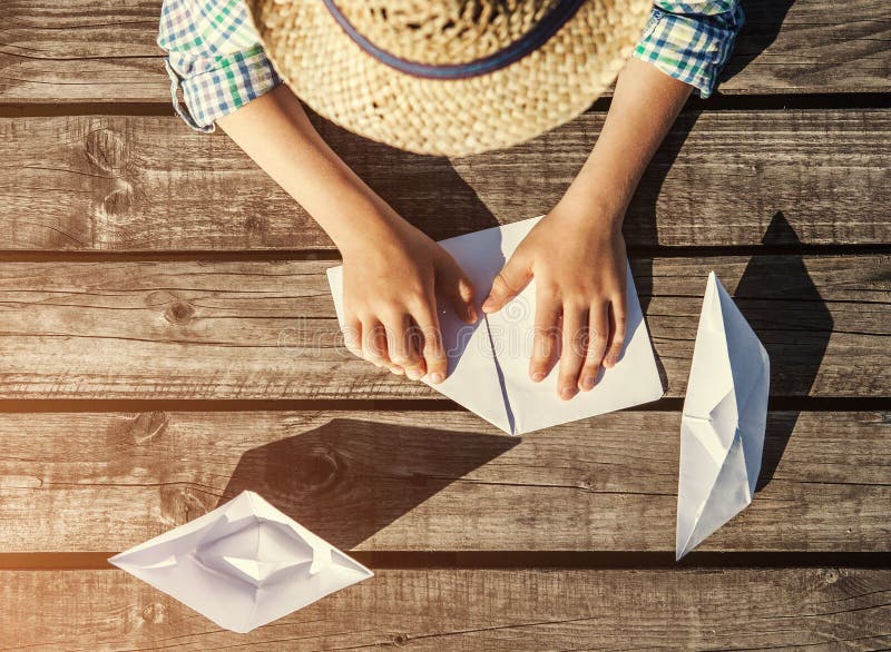 Close Up Image Boy Hands Making a Paper Boats Stock Image - Image of ...