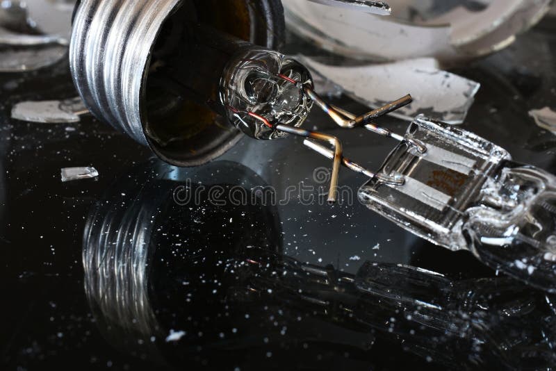 Broken Light Bulb Close Up stock photo. Image of object - 141516620