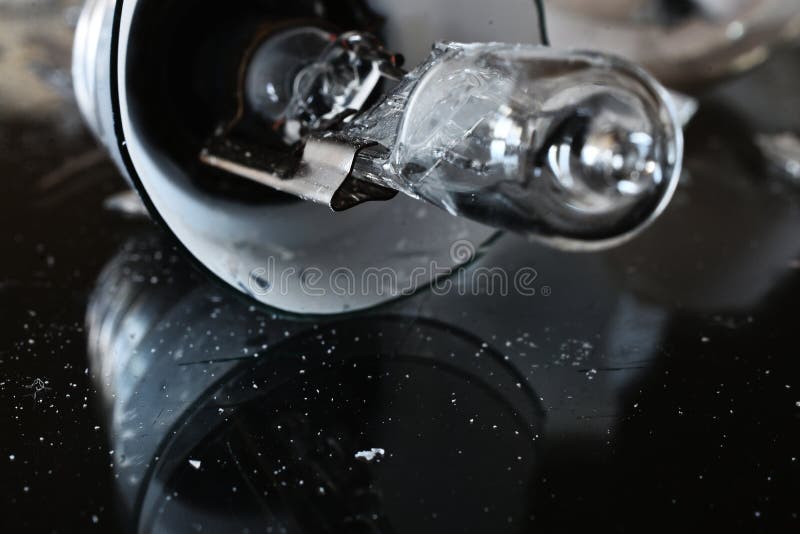 Broken Light Bulb Close Up stock photo. Image of object - 141516620