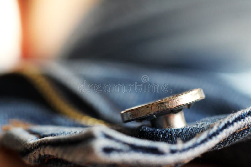 A Close Up Image of the Button and Stitching on a Pair of Jeans, Macro ...