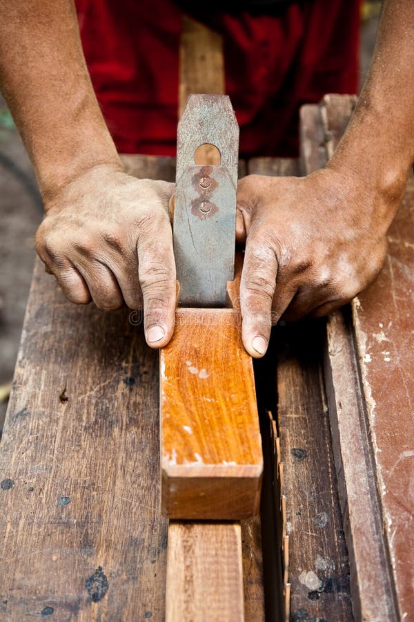 Carpenter Working on a Piece of Wood. Stock Photo - Image of ...