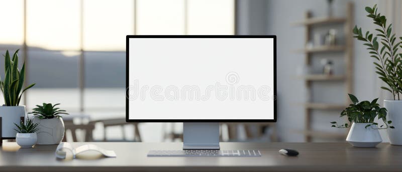 A Computer Desk in a Modern Co-working Space Feature a White-screen ...