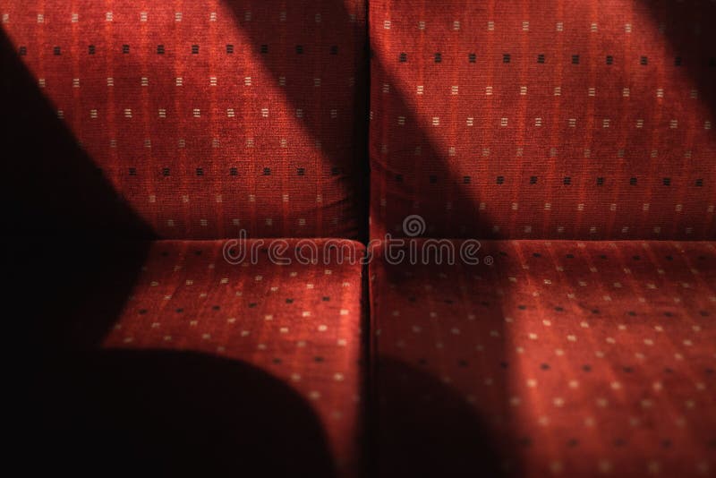 Close-up Image Features Old, Red Train Seats with White Polka Dots All ...