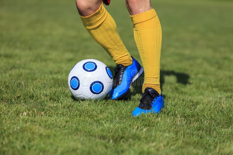 Dribbling stock image. Image of lawn, male, shoes, competition - 251334177