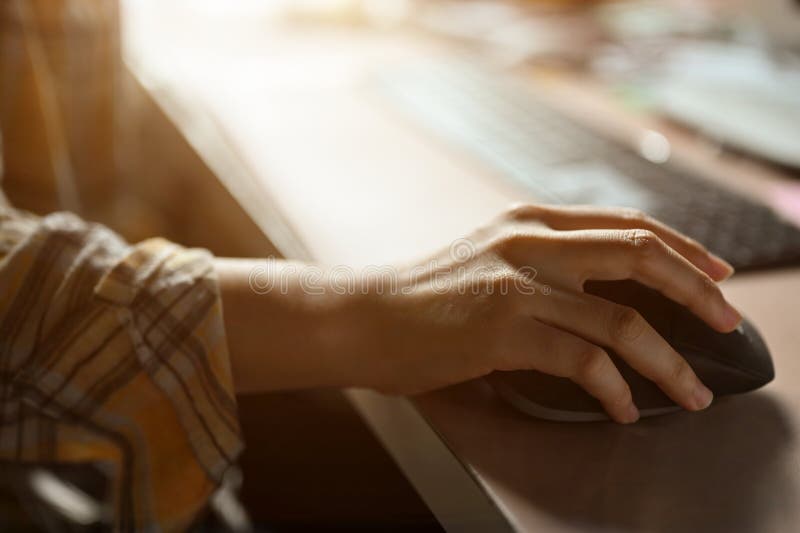 Close-up Image, Female Hand Using a Wireless Computer Mouse at Her ...