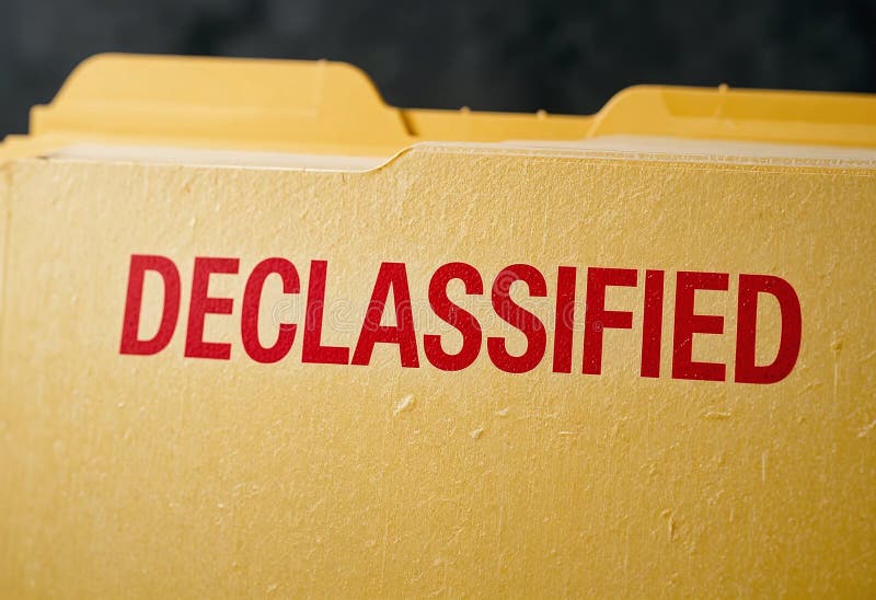 Close-up of a Declassified File Folder with Bold Red Text on a Textured ...