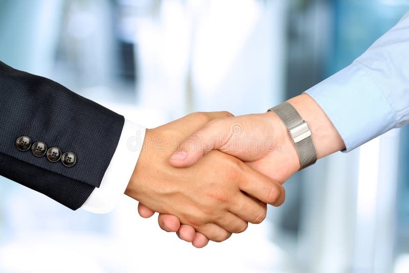 Close-up Image of a Firm Handshake between Two Colleagues Stock Photo ...