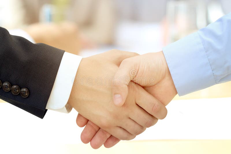 Close-up Image of a Firm Handshake between Two Colleagues Stock Image ...