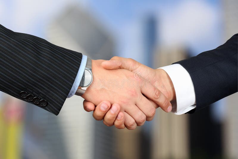 Close-up Image of a Firm Handshake between Two Colleagues Outsi Stock ...