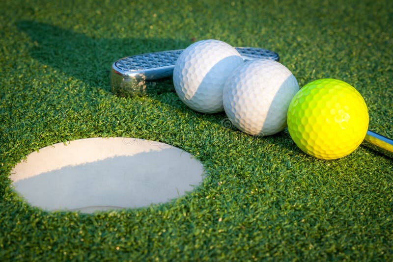 Close Up Image of Golf Hole with Balls and Putt Stock Photo - Image of ...
