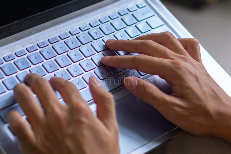 Close Up Image of Hands Typing on Laptop Computer Keyboard and Surfing ...
