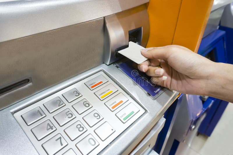 Close Up Image of a Human Hand Inserting a Credit Card in the at Stock ...