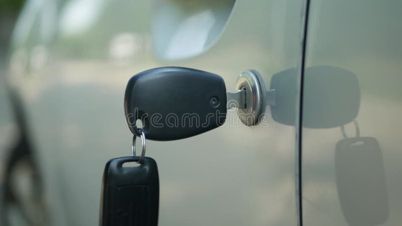 Close-Up Image with Keys and Remote Control in the Car Door Lock Stock ...