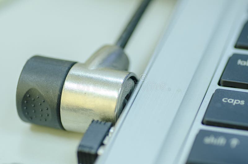 Close-up Image of Laptop Locked by Cable Lock for Security Concept ...